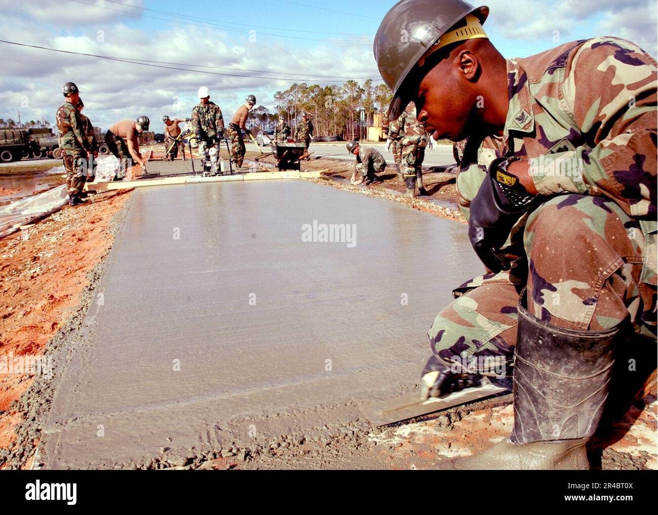 US Navy Builder 3rd Class assigned to Naval Mobile Construction ...