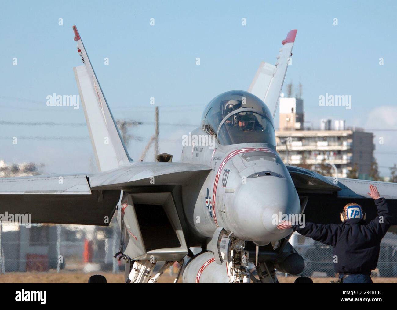 US Navy A plane captain assigned to the Diamondbacks of Strike Fighter ...