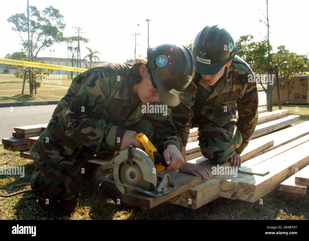 US Navy Builder Constructionman assigned to Naval Mobile Construction ...