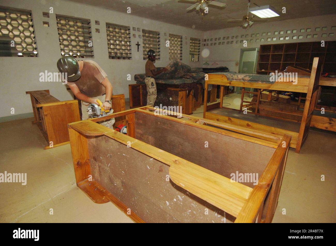 US Navy Construction Mechanic 3rd Class a U.S. Navy Seabee assigned to ...