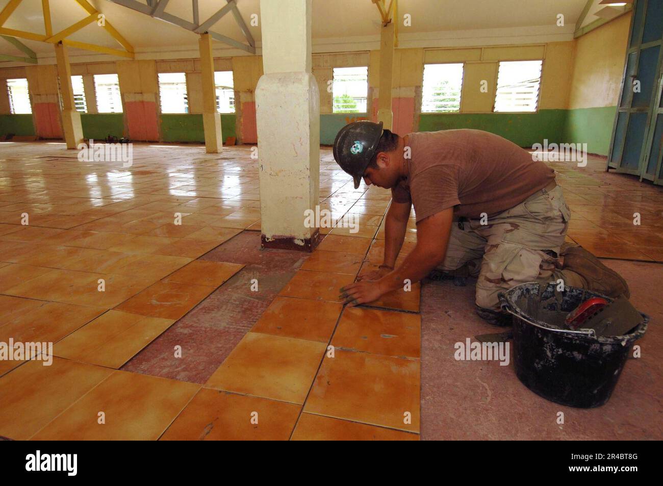 US Navy Builder 3rd Class assigned to Naval Mobile Construction ...