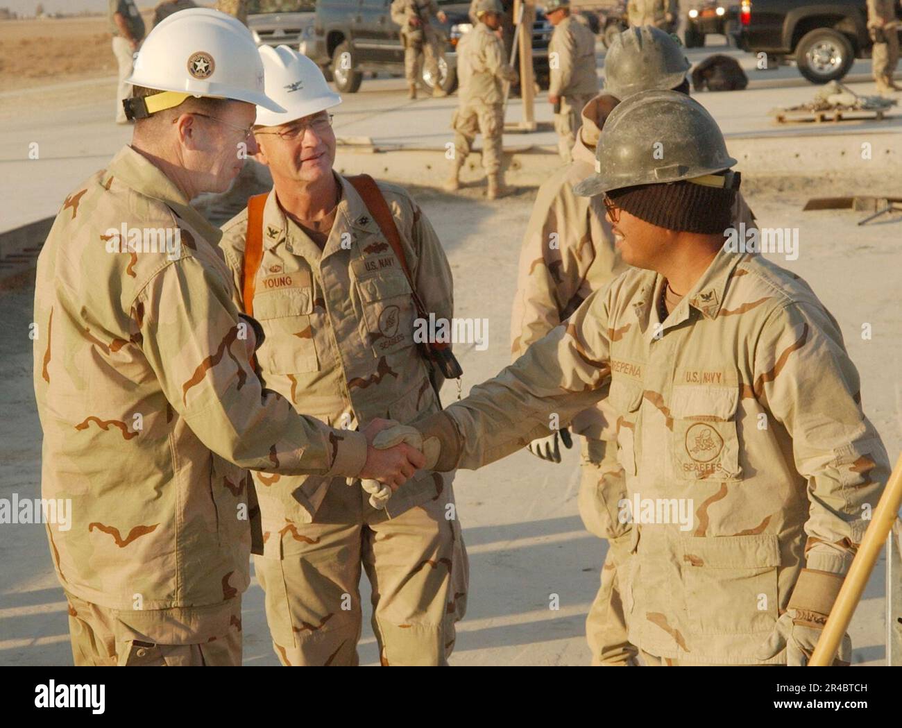 US Navy Chief of Naval Operations, Adm. Mike Mullen, left, greets ...