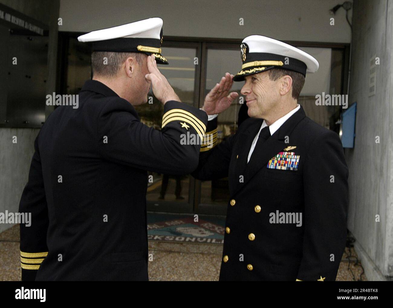 US Navy Capt. and Cmdr. exchange salutes as assumes command of Naval ...