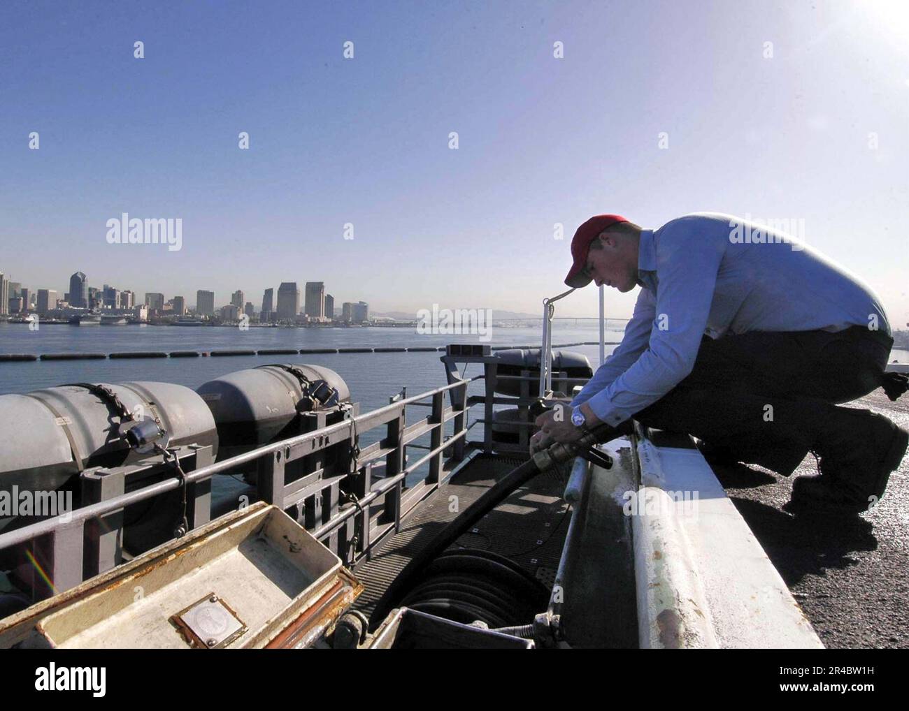 US Navy Aviation Ordnanceman Airman Recruit services an Aqueous Film ...