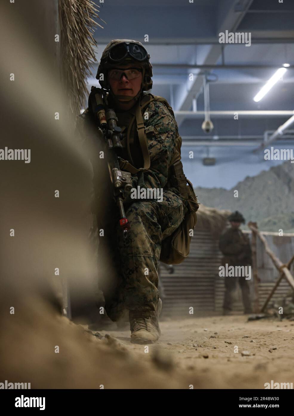 A U.S. Marine with India company, 3rd Battalion, 2nd Marines, posts a ...