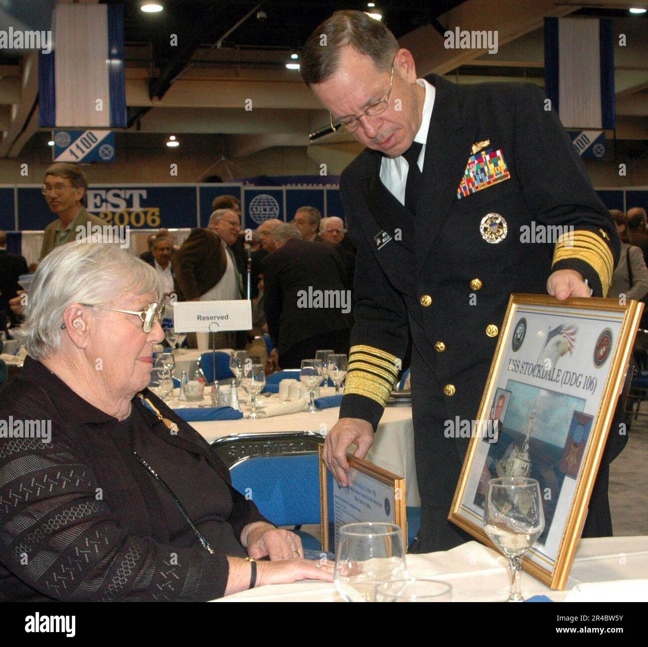 US Navy Chief of Naval Operations (CNO), Adm. Mike Mullen, presents a ...