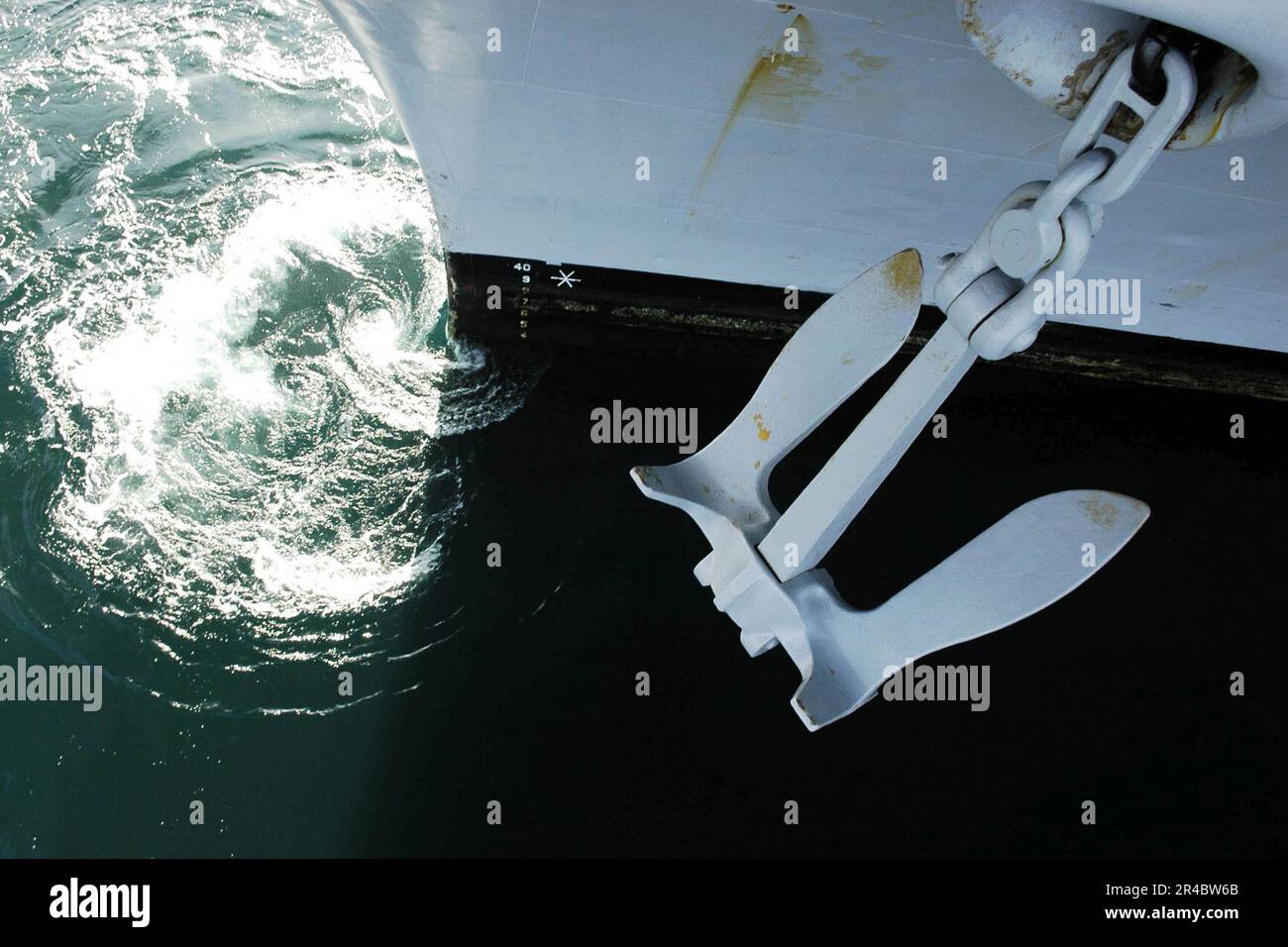 US Navy The port side Mark II Stockless Anchor is raised aboard the ...