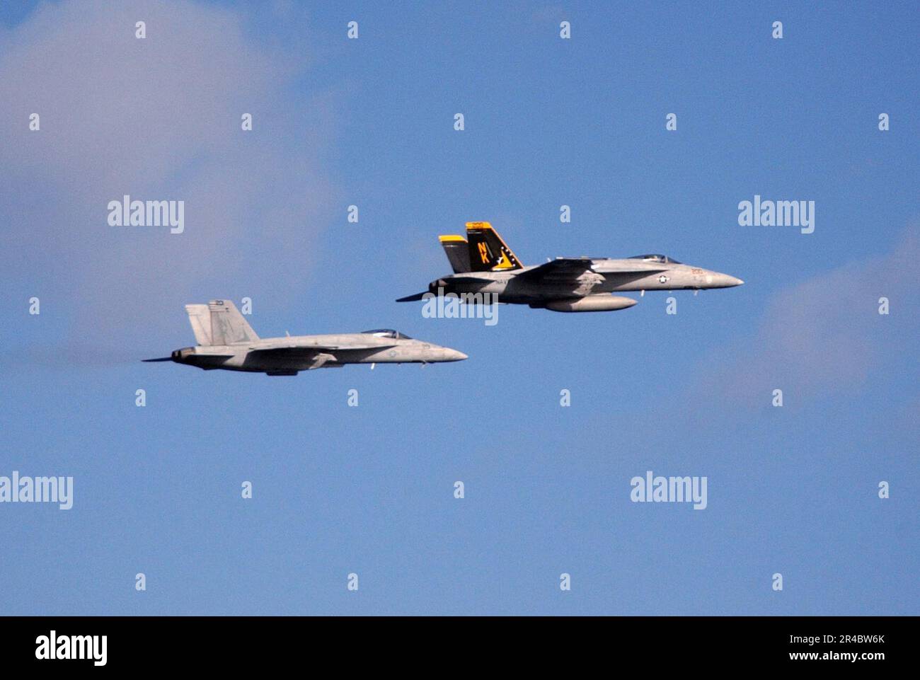 US Navy Cmdr. right, assumes command of the Eagles of Strike Fighter ...