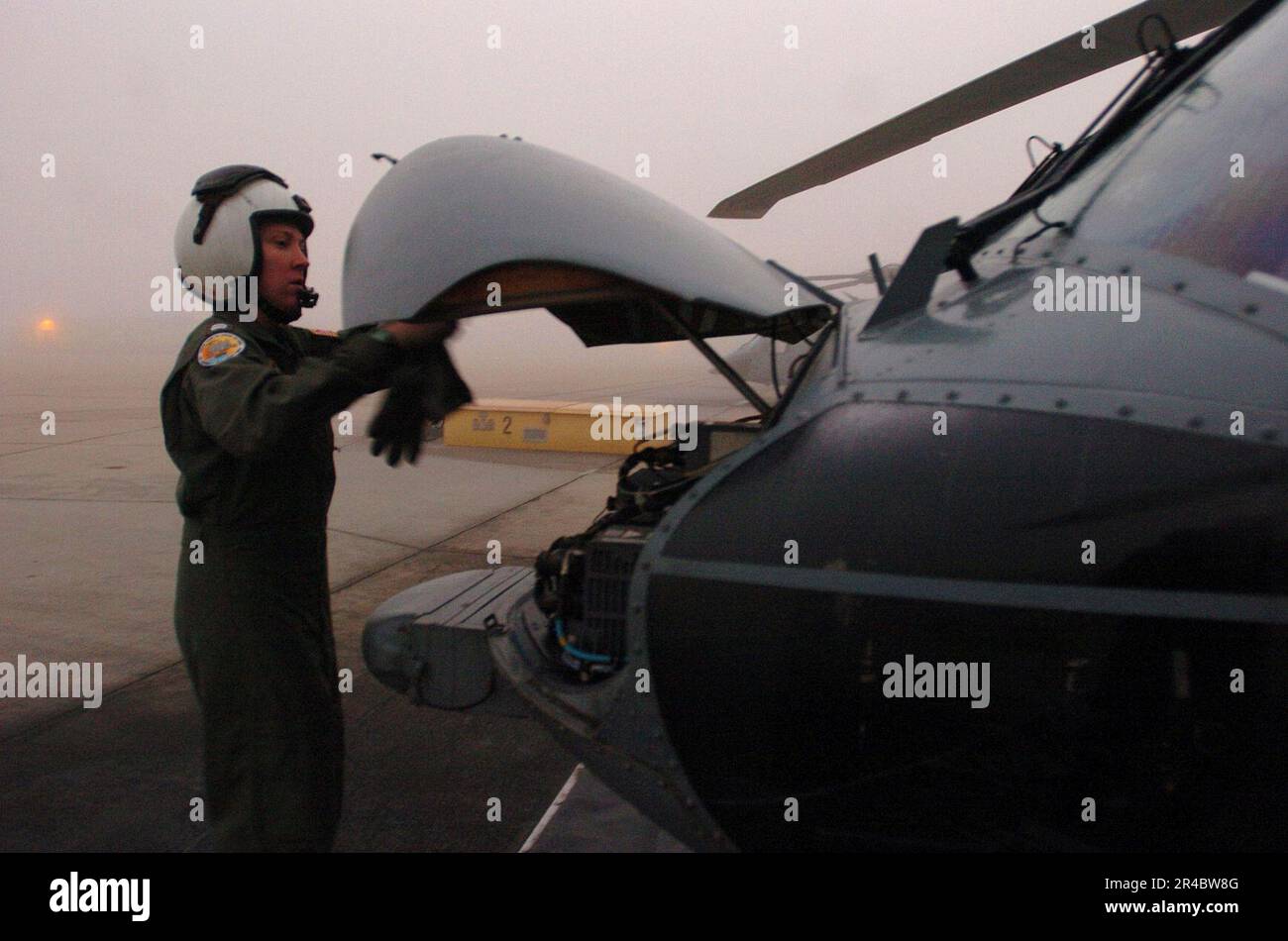 US Navy Lt. a MH-60S Seahawk helicopter pilot, assigned the Black Jacks ...