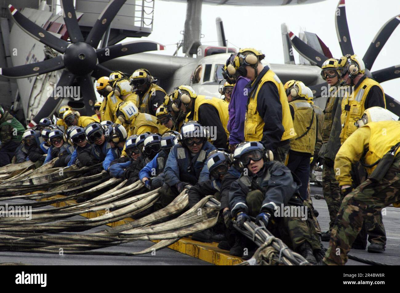 US Navy Sailors practice an emergency barricade exercise during a ...