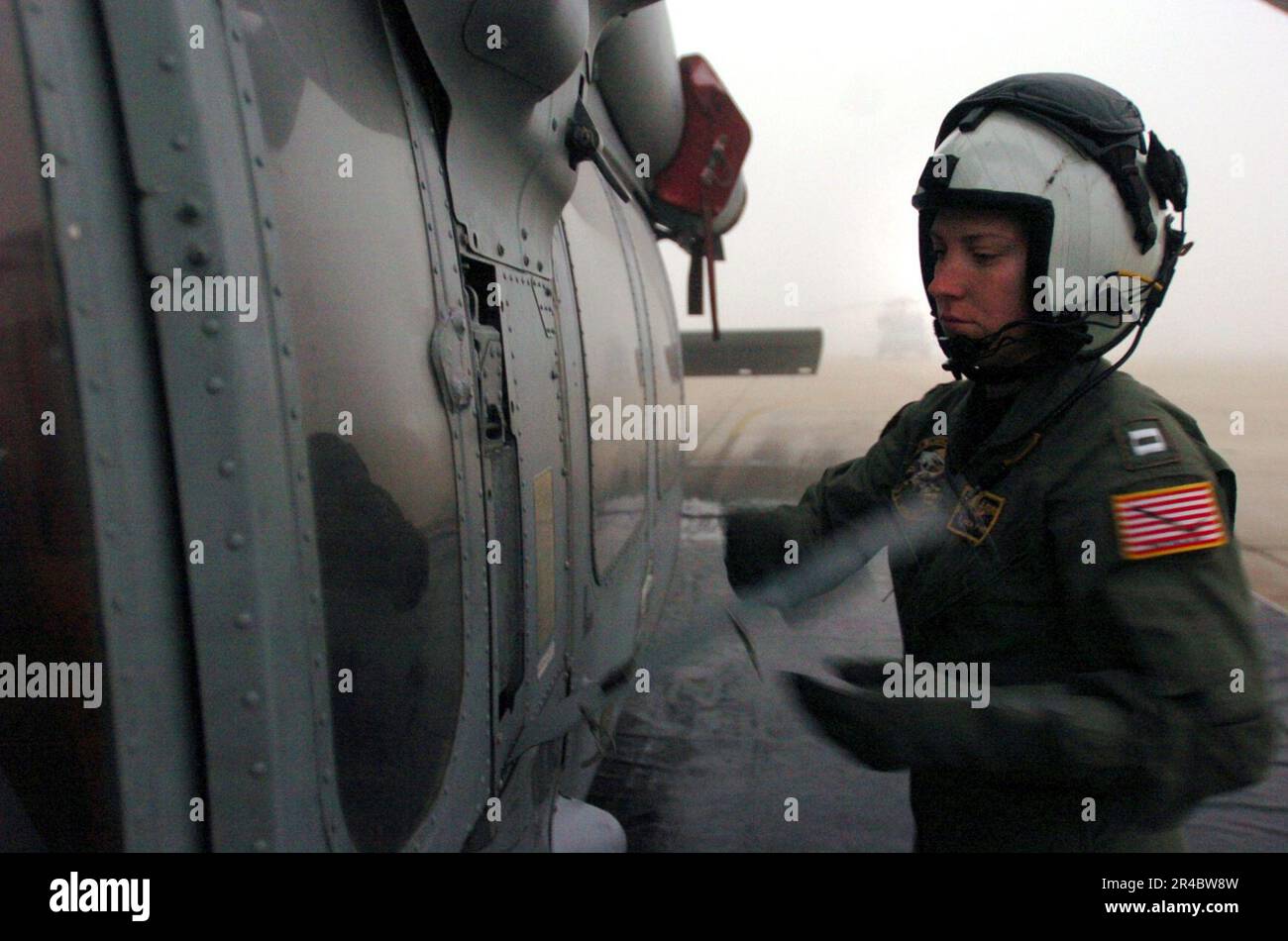 US Navy Lt. a MH-60S Seahawk helicopter pilot, does an early morning ...