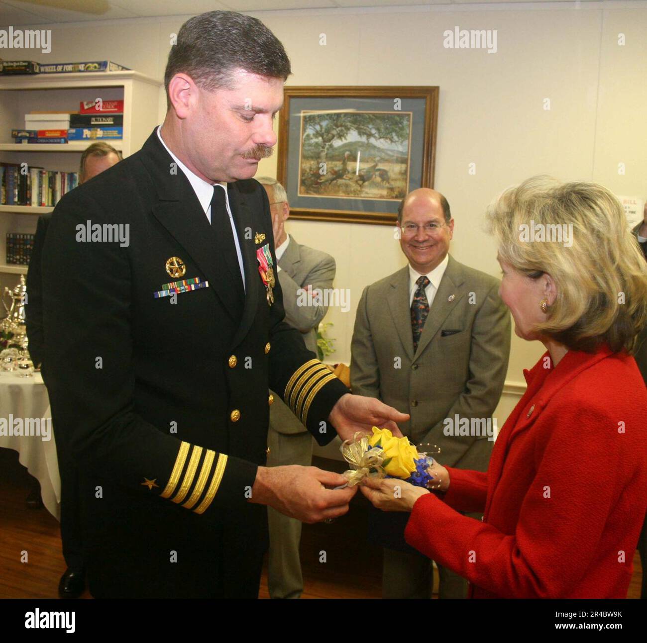 US Navy USS San Antonio (LPD 17) Commanding Officer, Captain presents ...