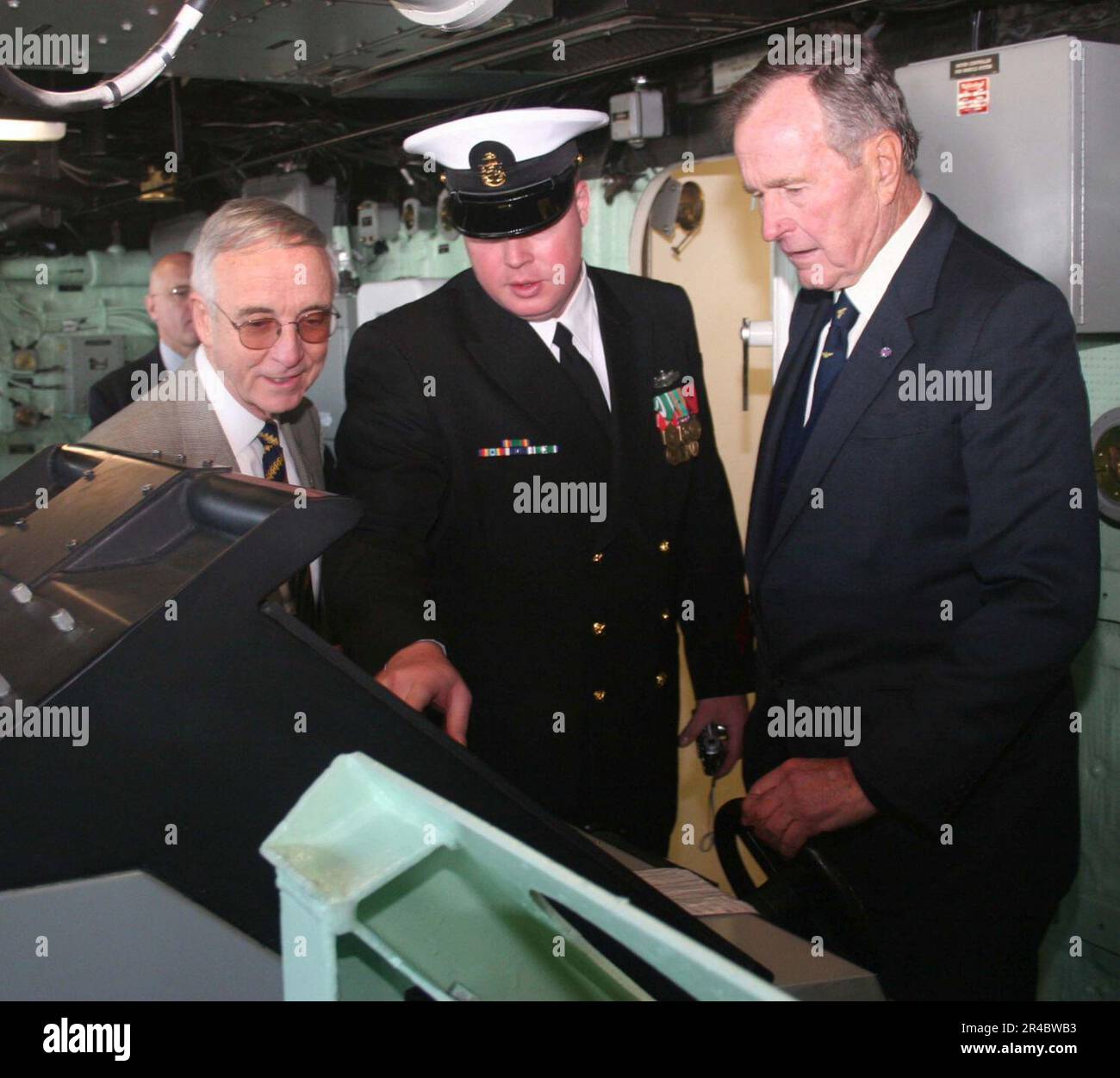 US Navy Chief Quartermaster discusses the operation of the ship's helm ...