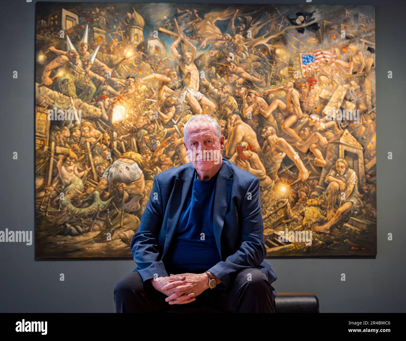 Scottish artist Peter Howson with a painting at When the Apple Ripens ...
