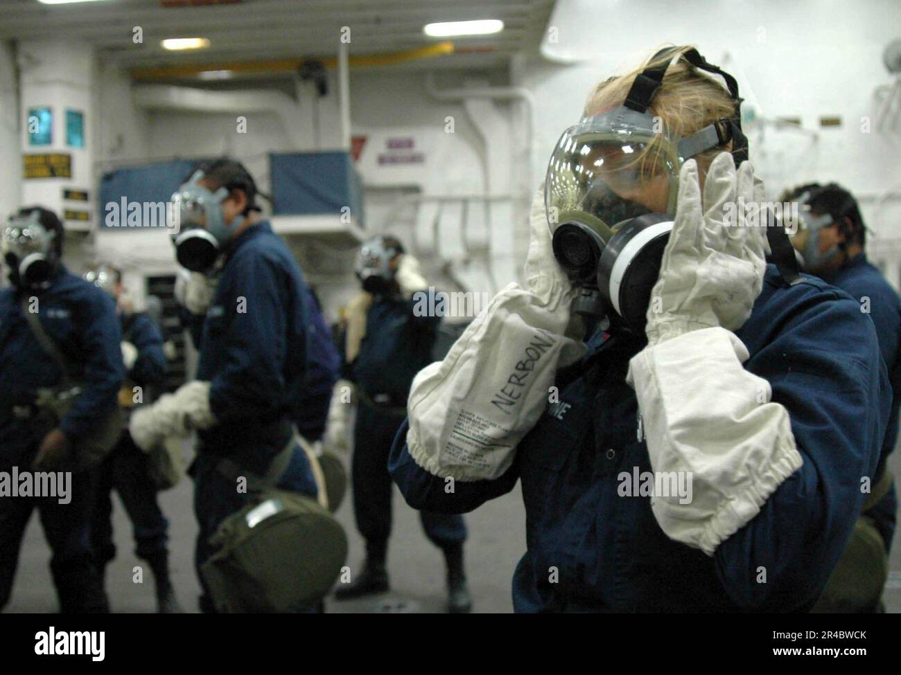 US Navy Information Systems Technician 2nd Class get fit tested for her ...