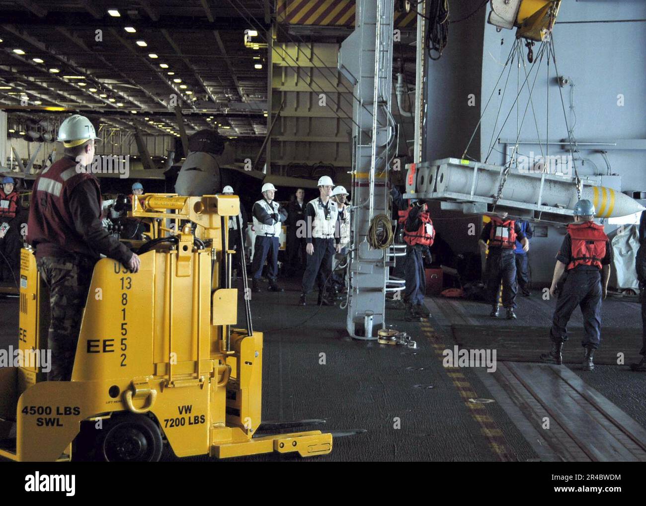 US Navy Sailors aboard the Nimitz-class aircraft carrier USS Abraham ...