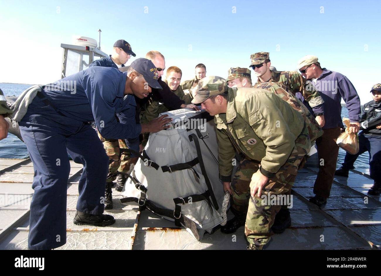 US Navy Sailors assigned to USS Comstock (LSD 45) and members of the U ...