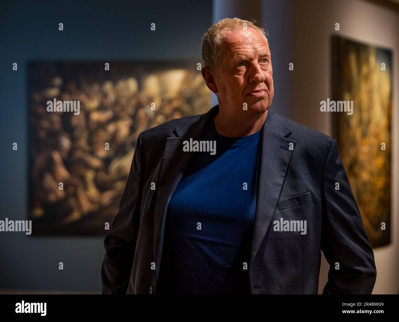 Scottish artist Peter Howson with a painting at When the Apple Ripens ...