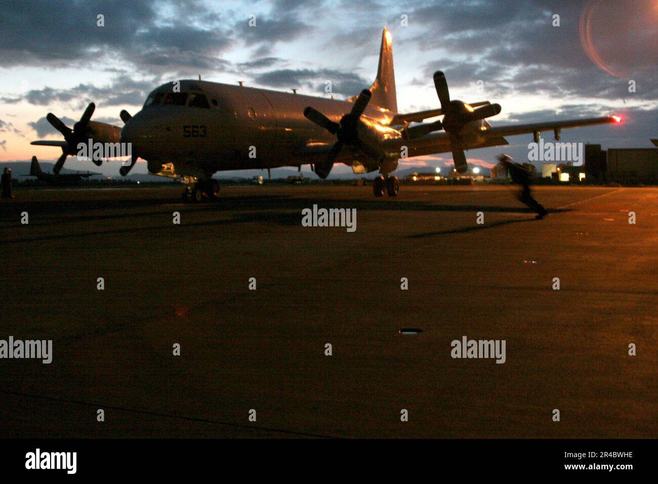 US Navy A Sailor assigned to Patrol Squadron Two Six (VP-26), heads ...