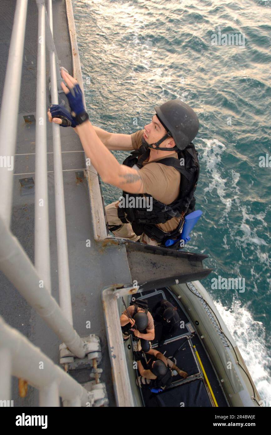 US Navy Visit Board Search and Seizure (VBSS) team members board the ...