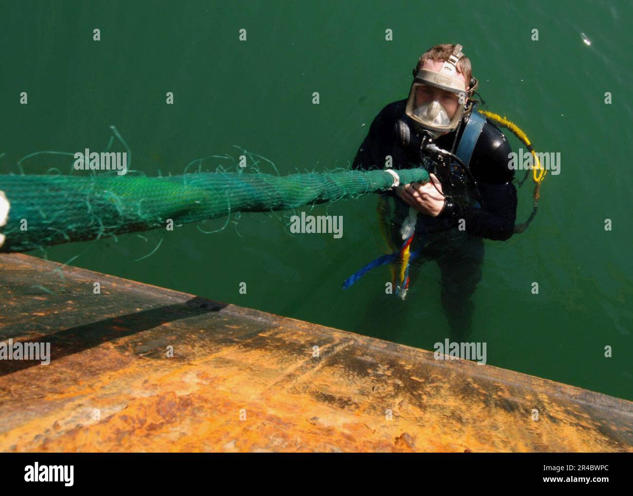 US Navy Gunner's Mate 2nd Class a Navy Deep Sea Diver embarked aboard ...