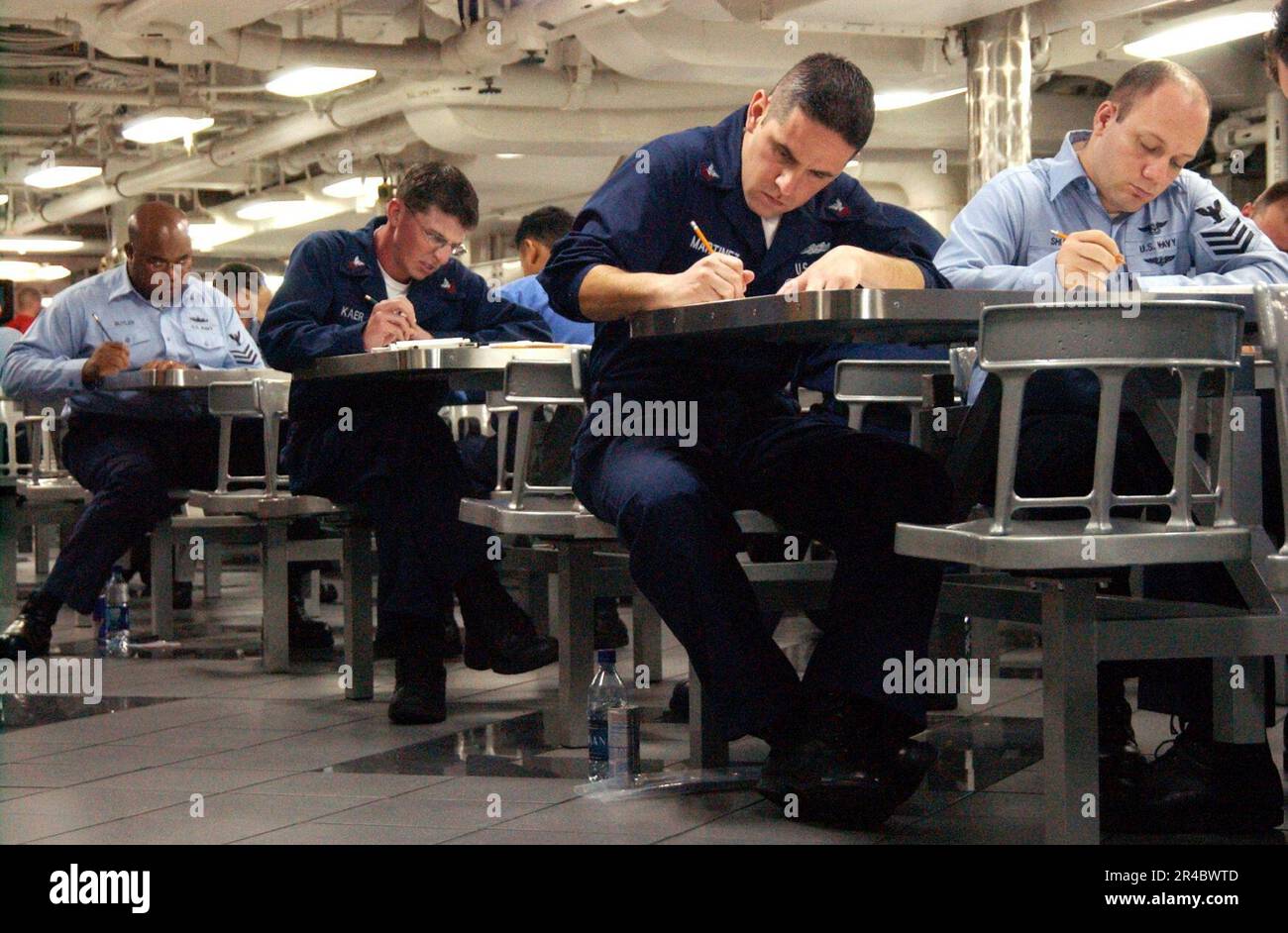US Navy First class petty officers stationed aboard the Nimitz-class ...
