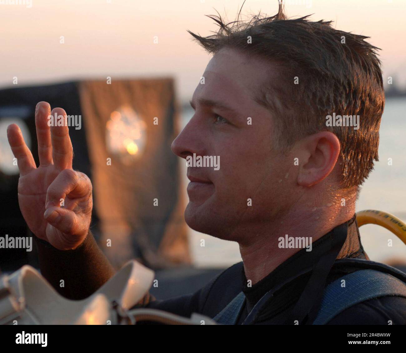 US Navy Quartermaster 1st Class a Navy Deep Sea Diver embarked aboard ...