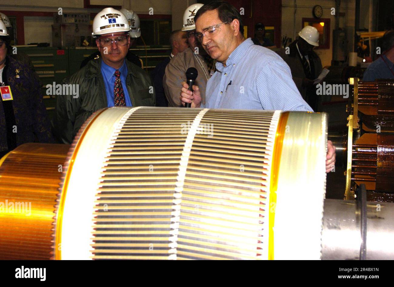 US Navy Motor Section Supervisor, explains to Secretary of the Navy ...