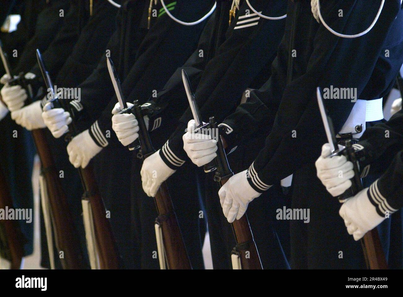 US Navy U.S. Navy Ceremonial Guards fix their bayonets as they conduct ...