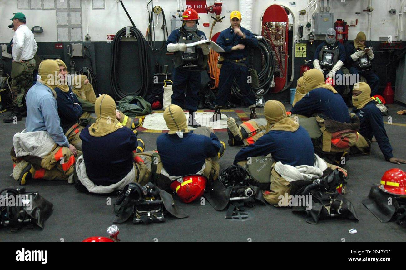 US Navy Repair locker Sailors assigned to the amphibious-assault ship ...