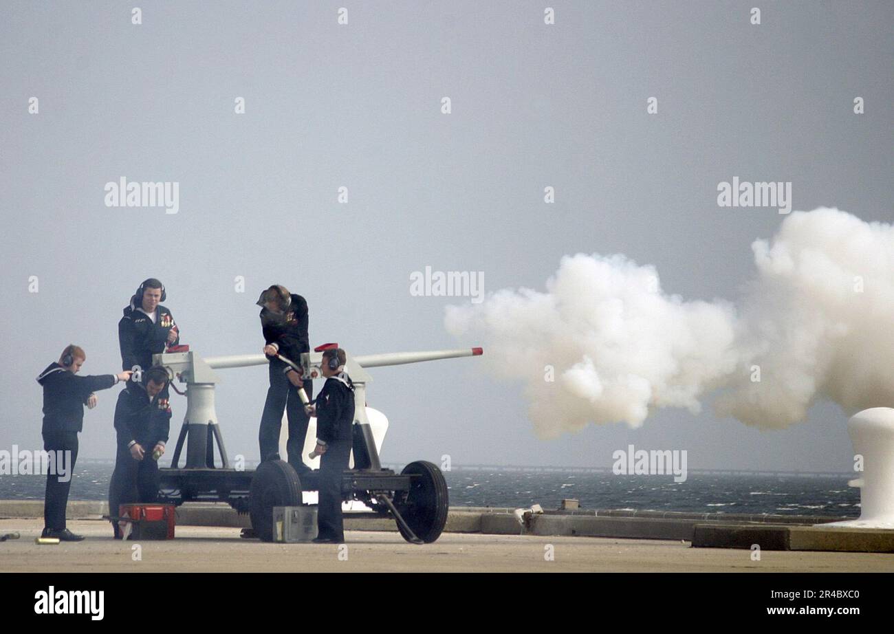US Navy Sailors execute a gun salute for Florida Senator Bill Nelson at ...