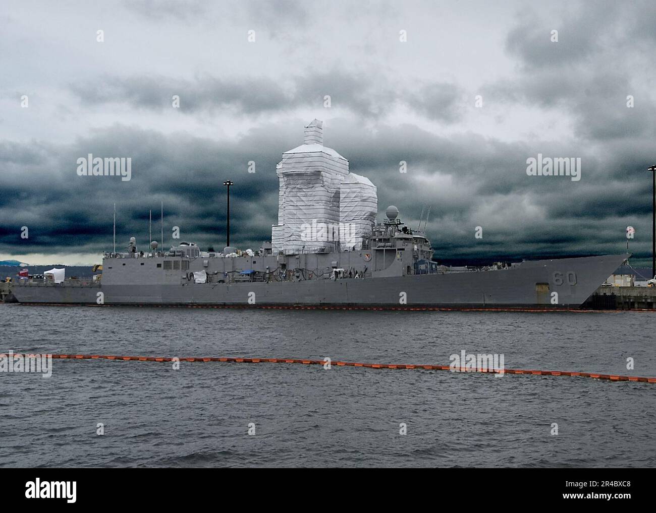 US Navy With construction covering complete on the mast, the Perry ...