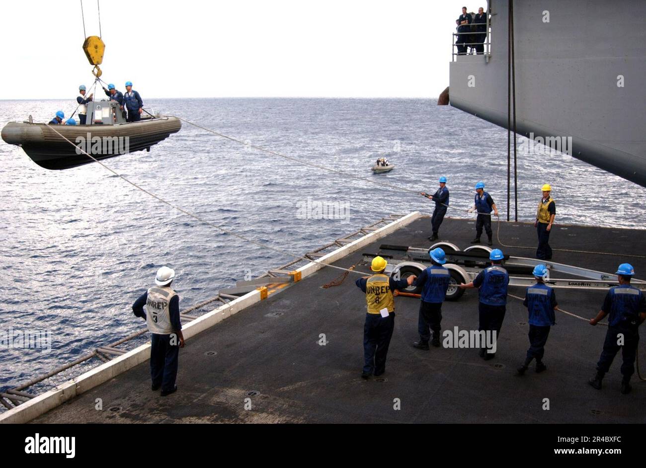 US Navy Deck Department crew members, assigned to the Nimitz-class ...