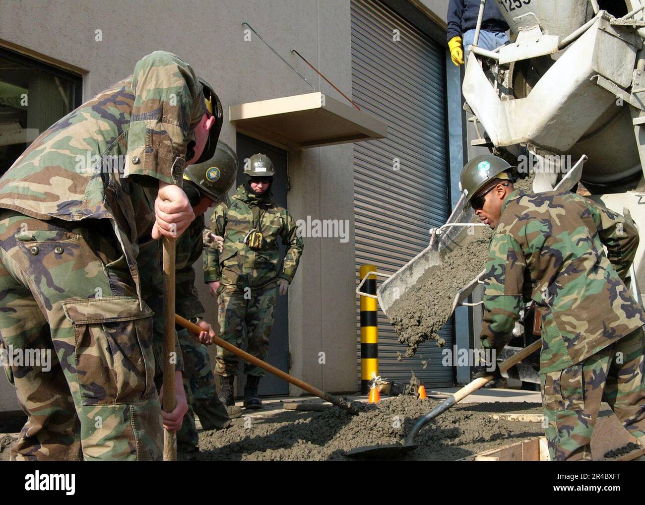 US Navy Seabees assigned to Naval Mobile Construction Battalion Four ...