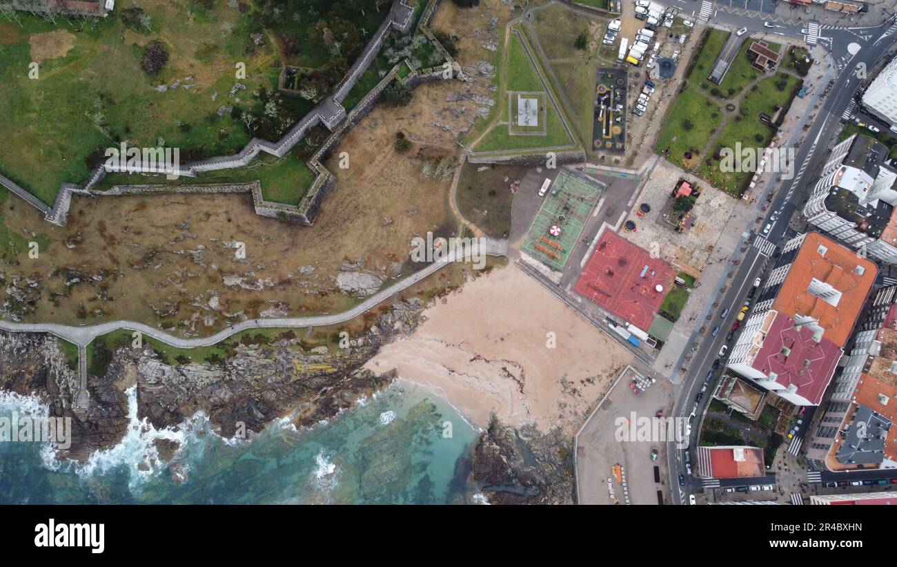 A scenic view of a beach with white-sanded shoreline, crystal clear ...