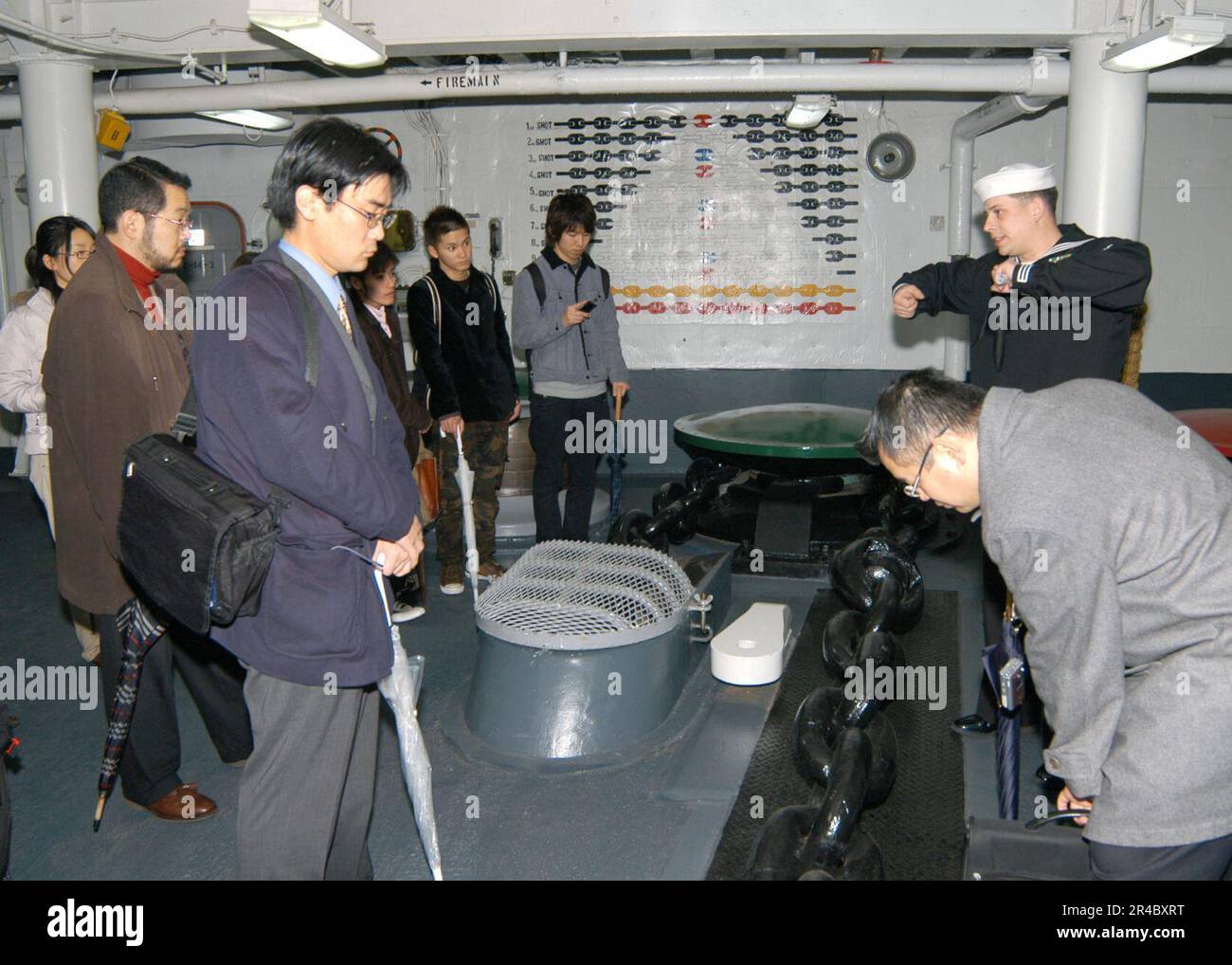 US Navy Boatswain's Mate 1st Class describes the anchor chain of the ...