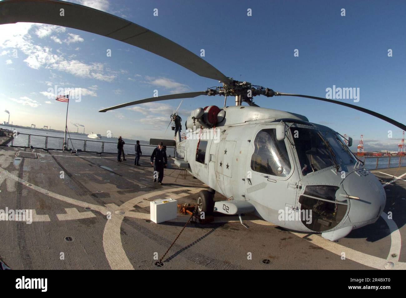 US Navy A SH-60B Seahawk Helicopter embarked aboard the command ship ...