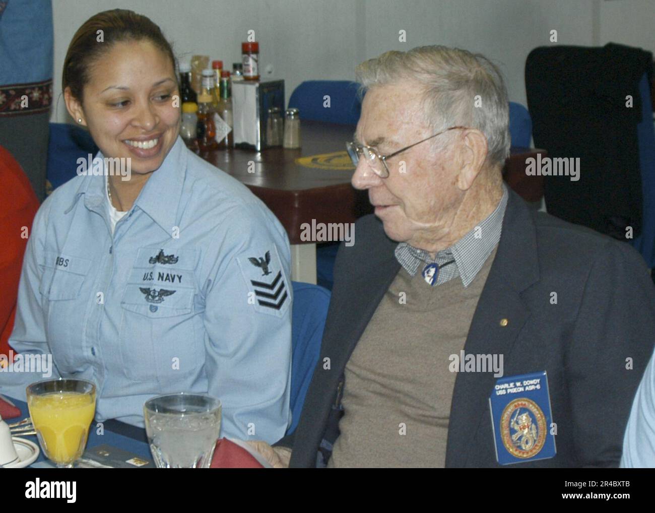 Us Navy Electronics Technician 1st Class Speaks During Breakfast Aboard