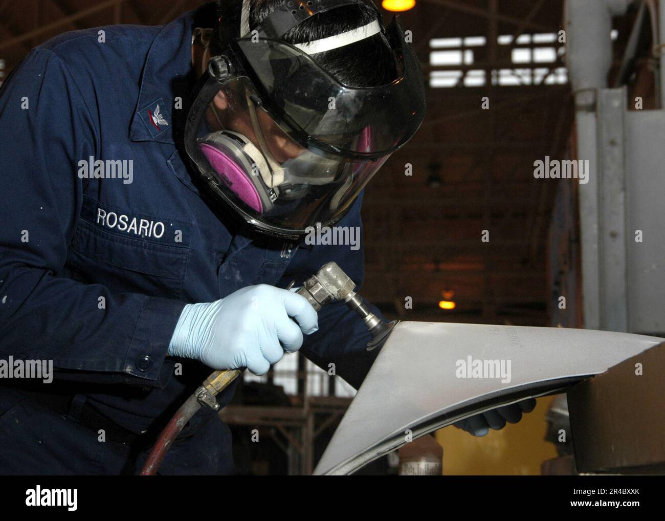 US Navy Aviation Structural Mechanic 3rd Class assigned to the Stock ...