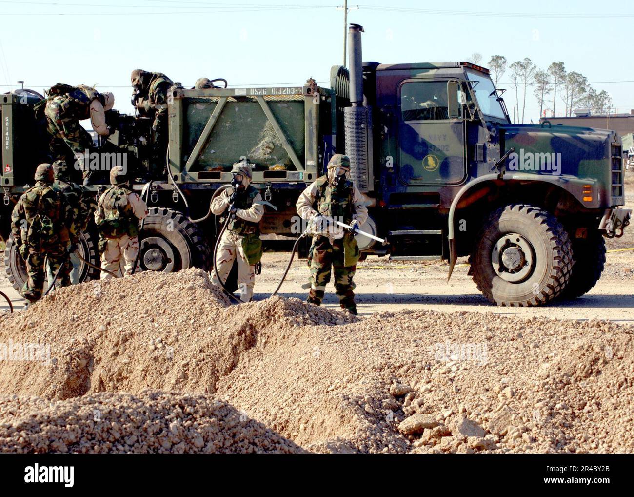 US Navy Jiffy Team members from Naval Mobile Construction Battalion One ...