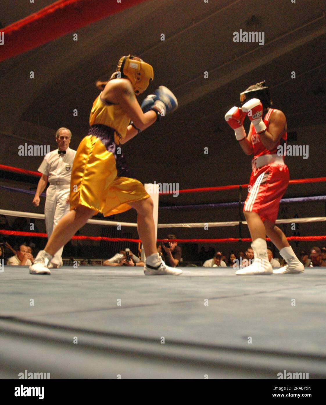 US Navy Information Systems Technician 2nd Class left, assigned to the ...