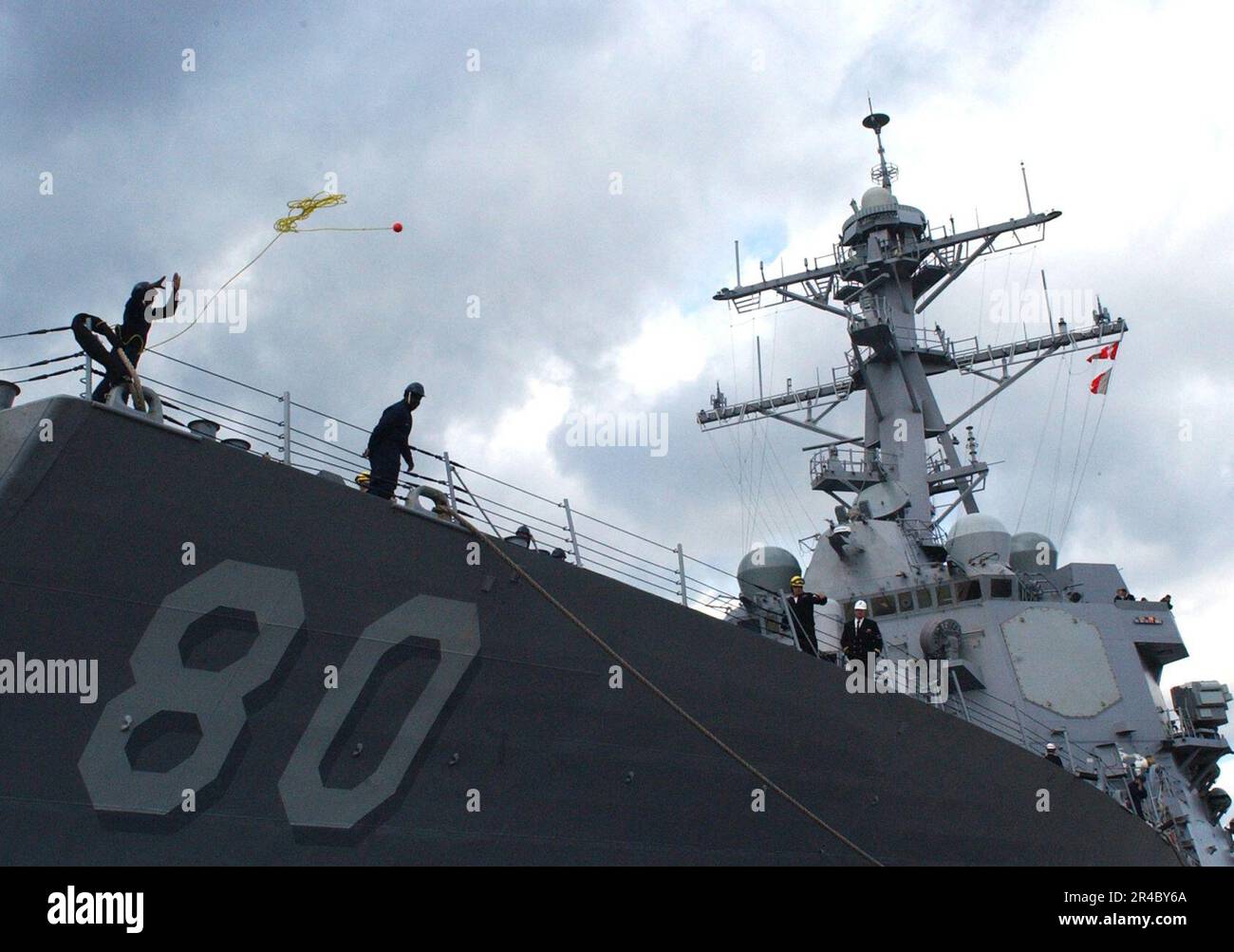 US Navy A Sailor stationed aboard the guided-missile destroyer USS ...