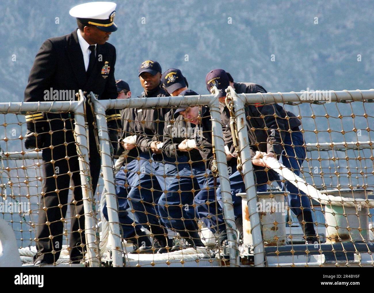 US Navy Sailors assigned to the guided-missile destroyer USS Roosevelt ...
