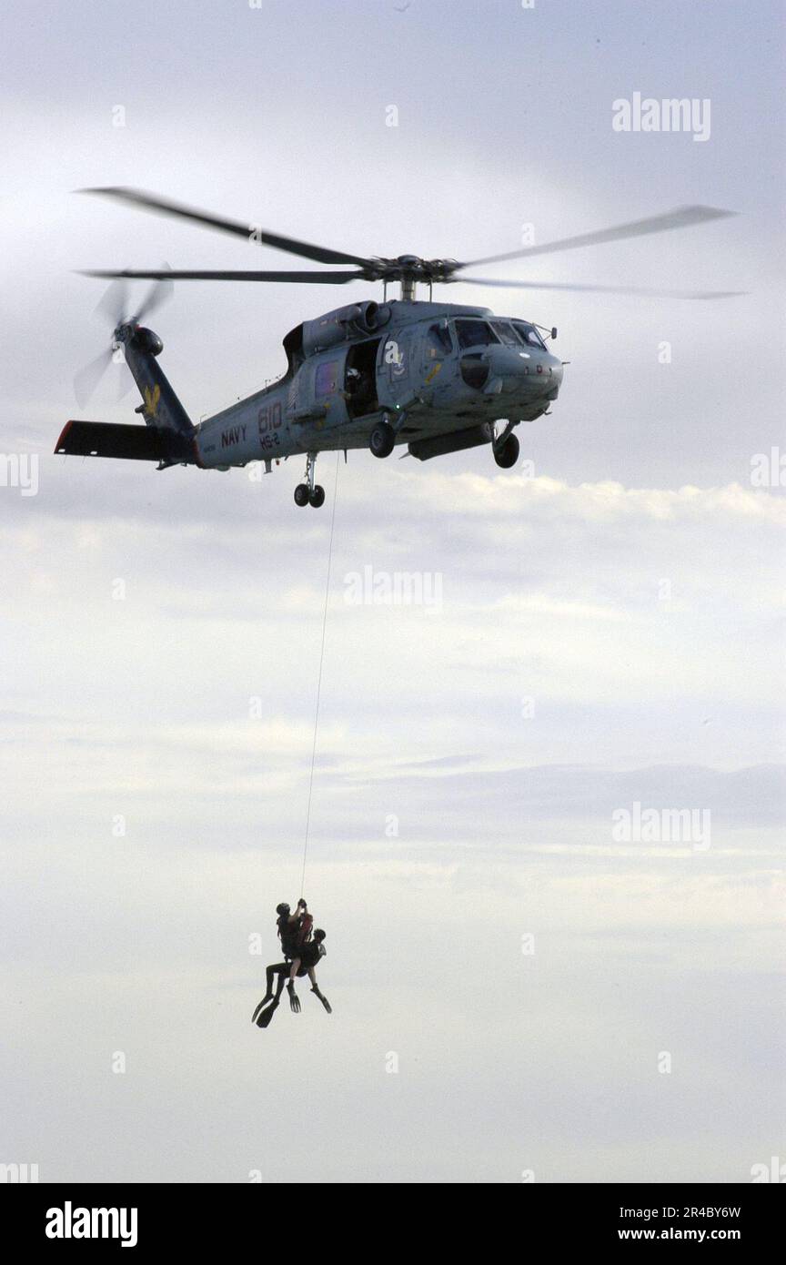 US Navy Search and Rescue (SAR) swimmers assigned to the Golden Falcons ...