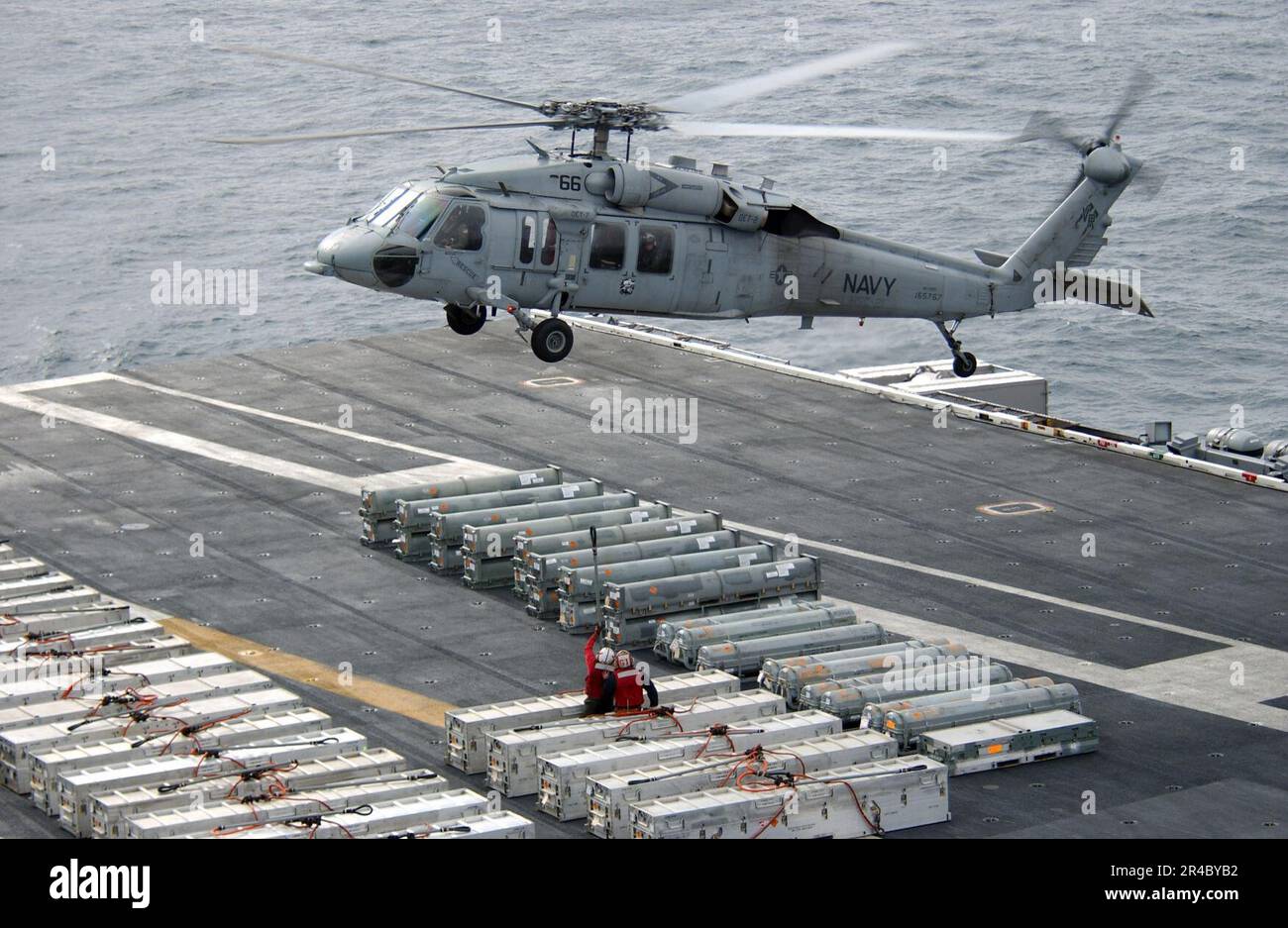 US Navy A MH-60S Seahawk assigned to the Black Jacks of Helicopter Combat Support Squadron Two ...