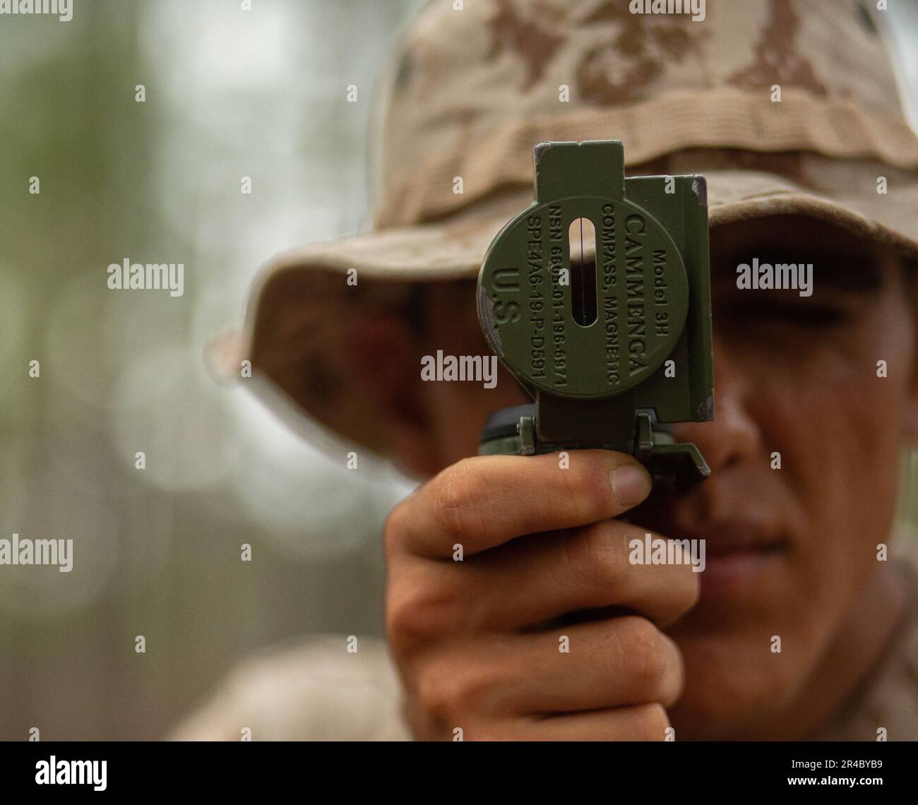 U.S. Marine Corps recruits with Hotel Company, 2nd Recruit Trainging Battalion conduct land ...