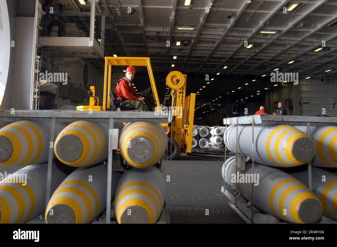 US Navy Aviation Ordenanceman Airman stationed aboard the Nimitz-class ...