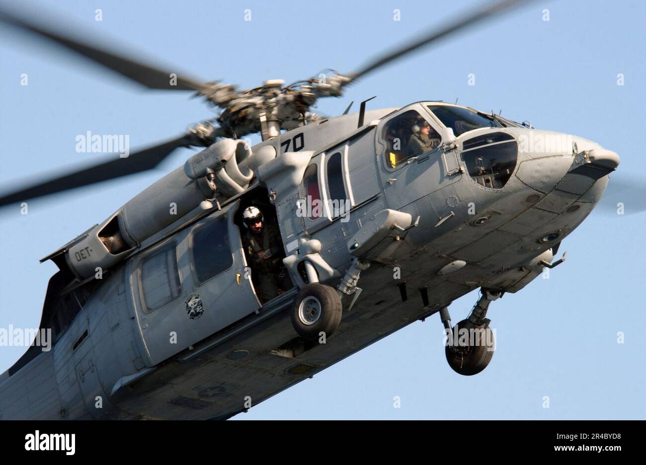 US Navy A MH-60S Seahawk helicopter assigned to the Black Jacks of ...