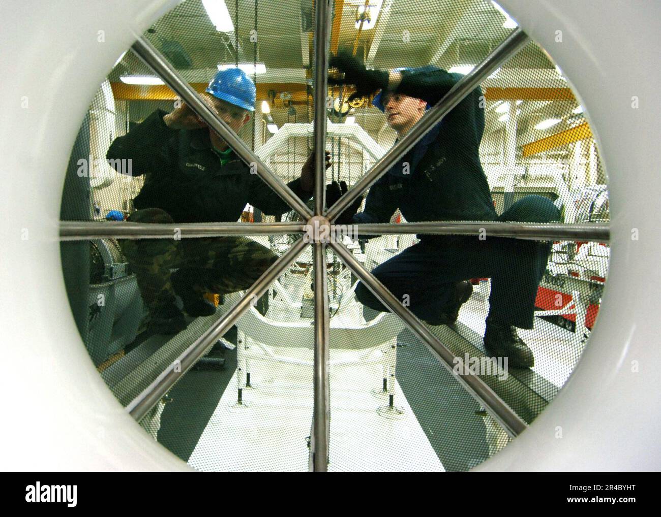US Navy Aviation Machinist Mates inspect a 414 Bell Mouth aboard ...