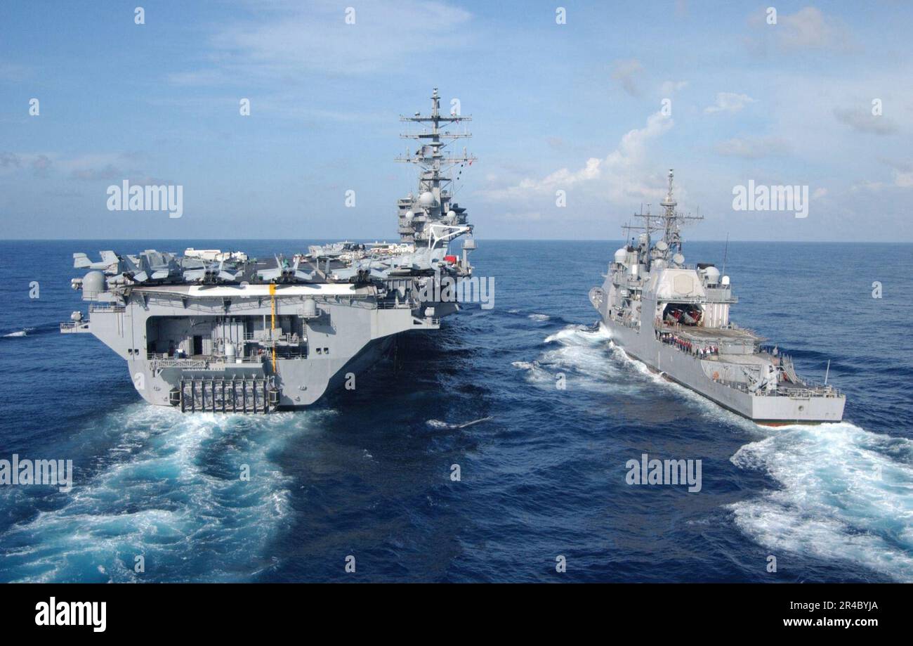 US Navy The guided-missile cruiser USS Lake Champlain (CG 57) comes ...